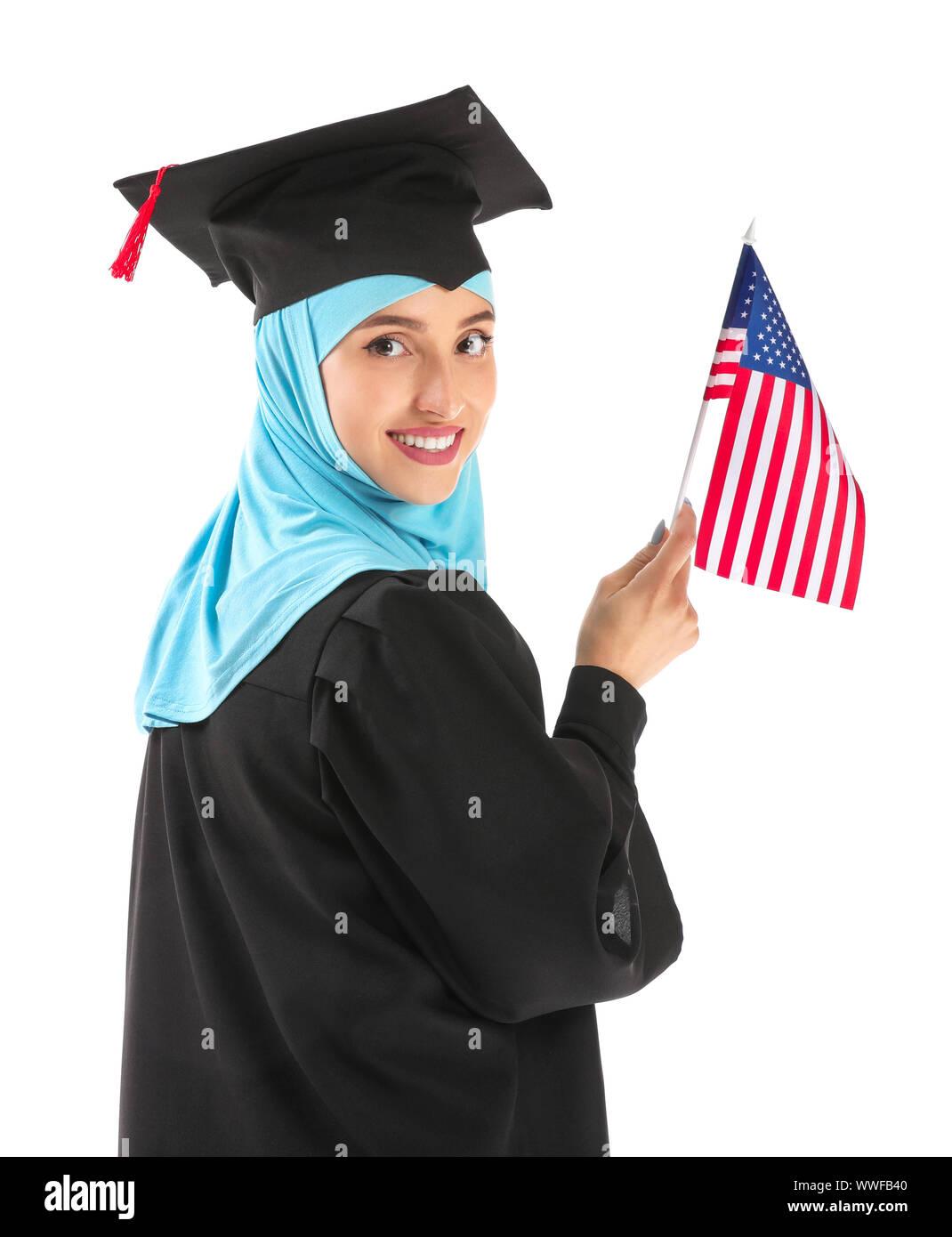 Muslim female graduate with USA flag on white background Stock Photo ...