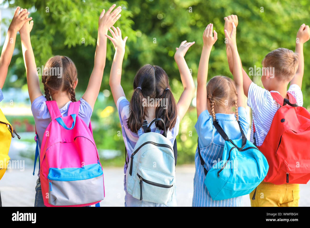 Group of cute little pupils outdoors Stock Photo - Alamy