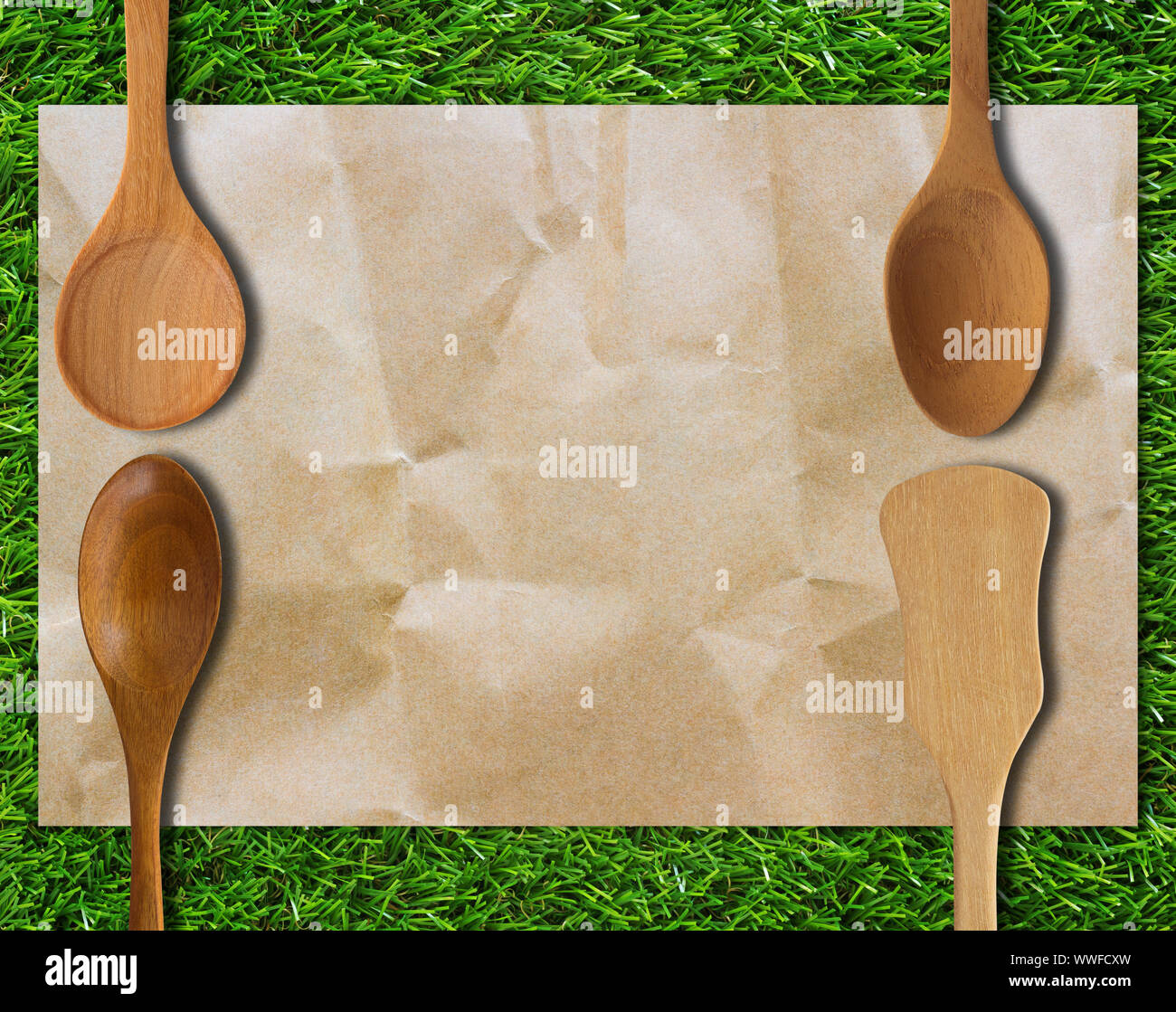 Wooden spoon on brown paper background, menu design concept Stock Photo ...