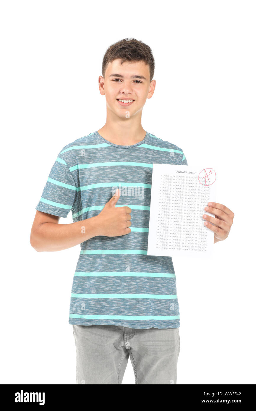 Happy boy with results of school test on white background Stock Photo ...