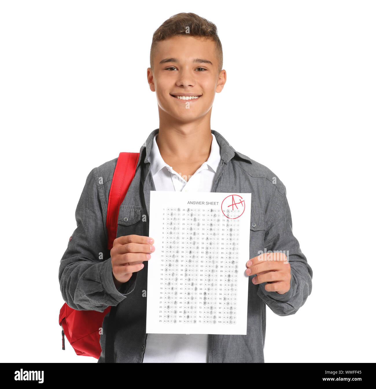 Happy boy with results of school test on white background Stock Photo ...