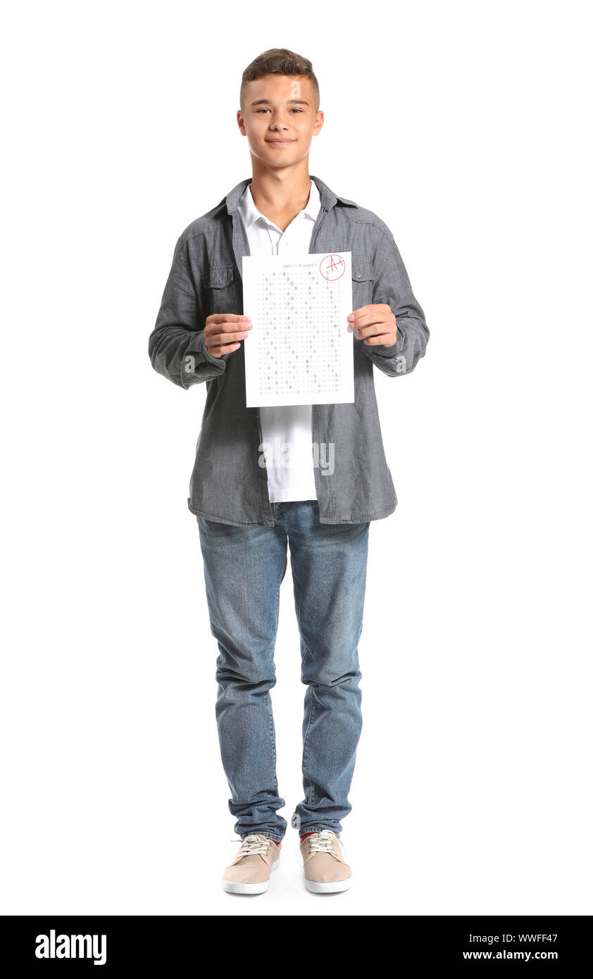 Happy boy with results of school test on white background Stock Photo ...