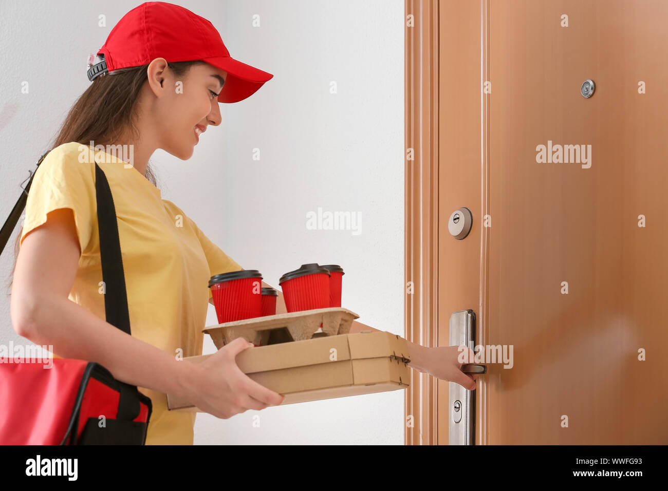 Food Delivery Person At Door