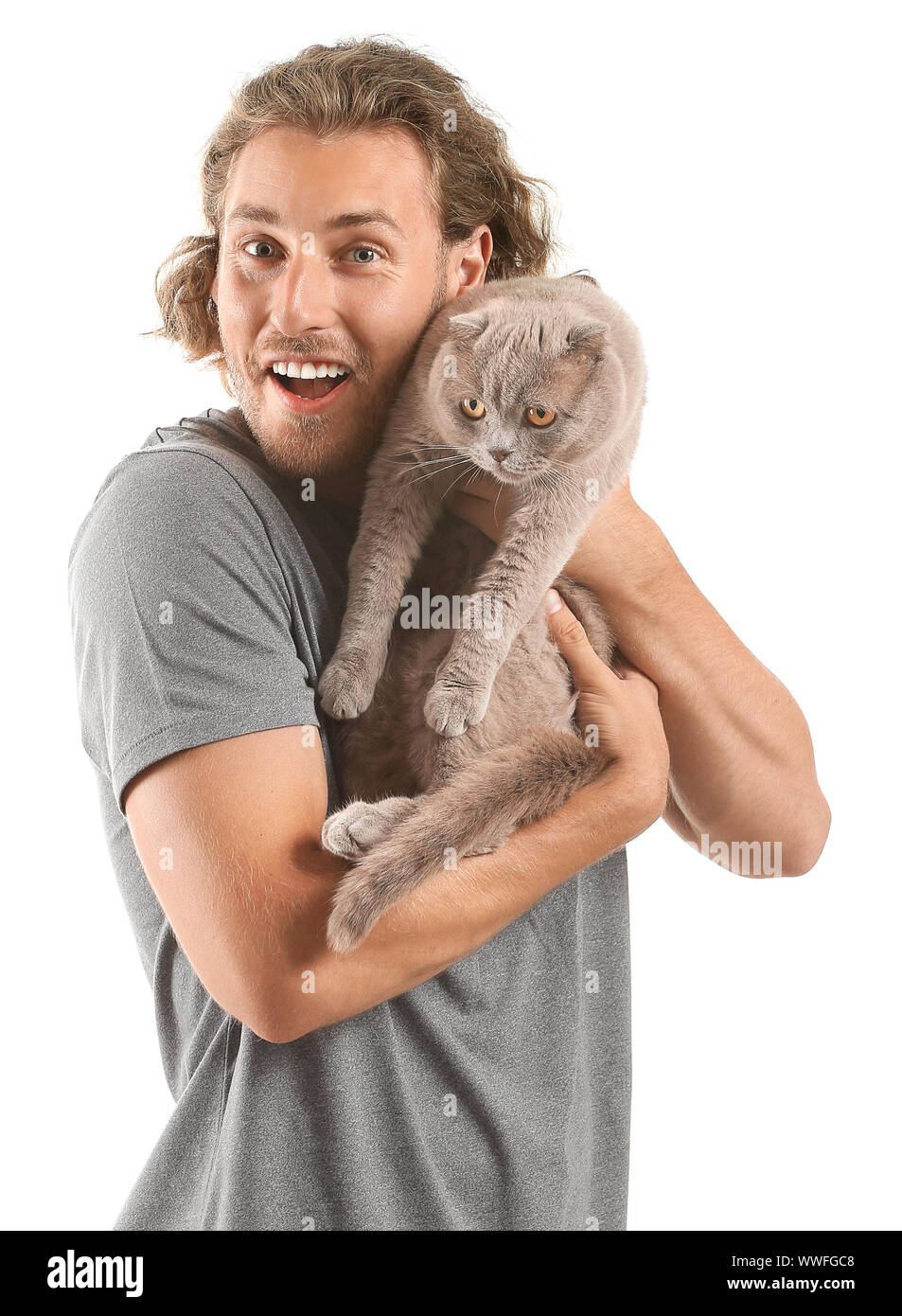 Man with cute funny cat on white background Stock Photo - Alamy