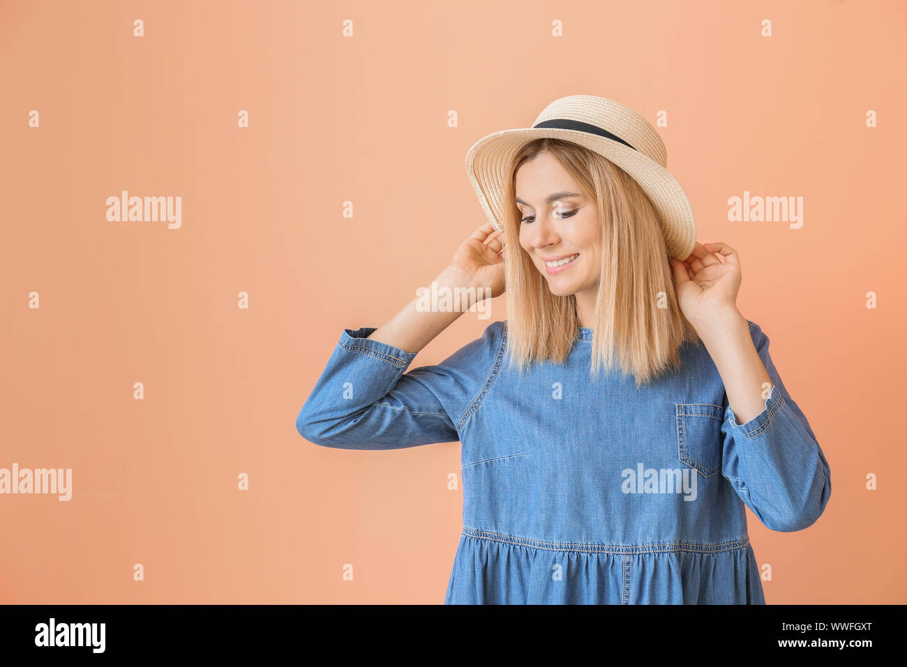 Beautiful stylish woman on color background Stock Photo - Alamy