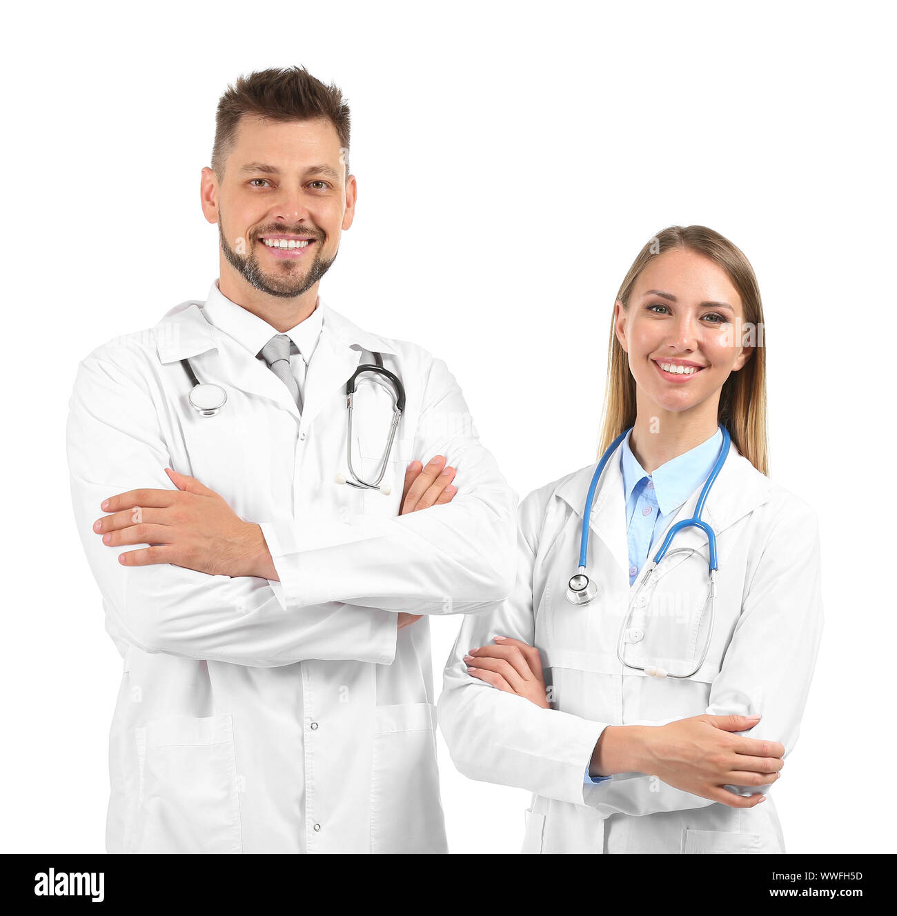 Male and female doctors on white background Stock Photo - Alamy