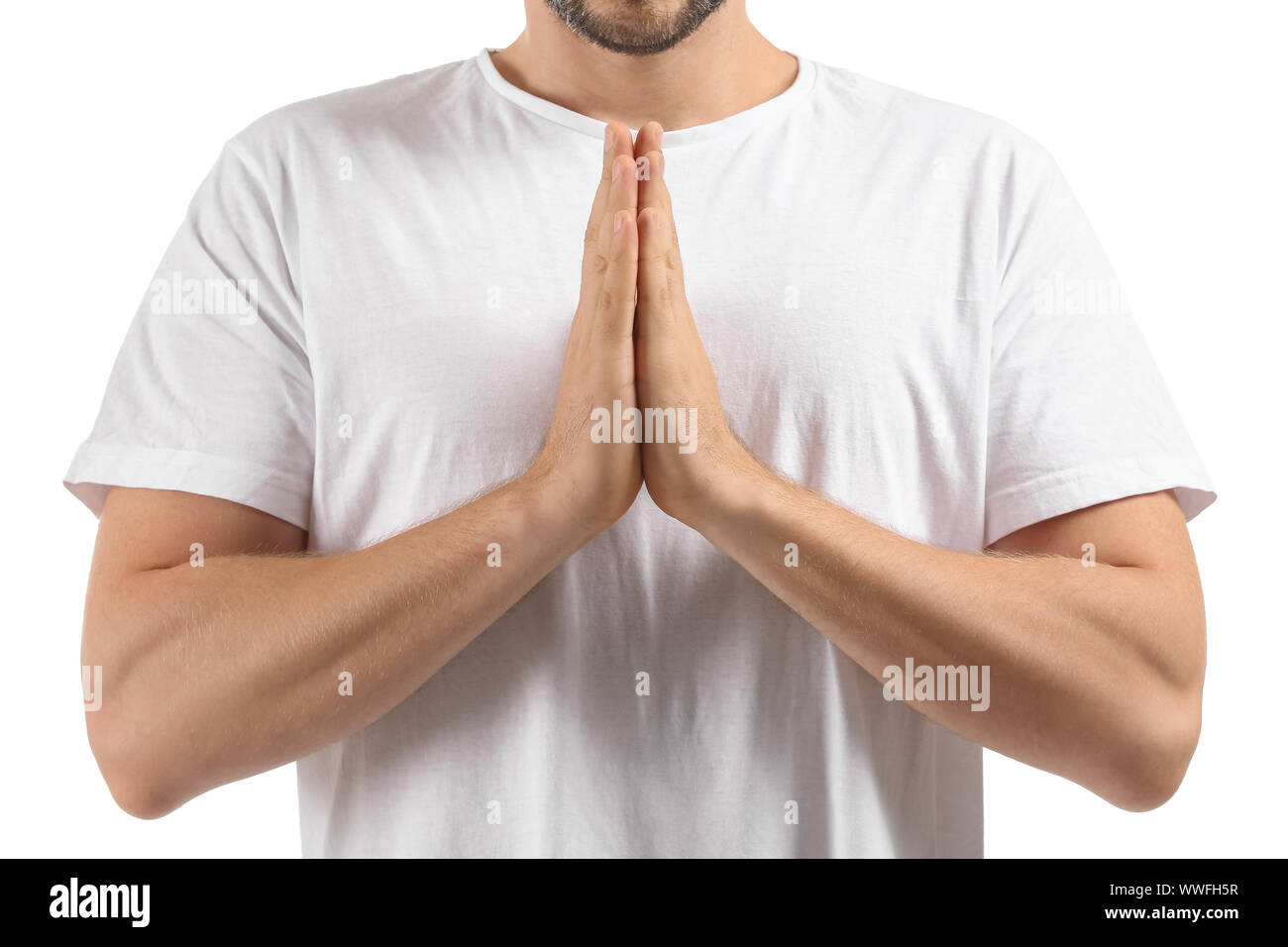 Religious man praying on white background, closeup Stock Photo - Alamy
