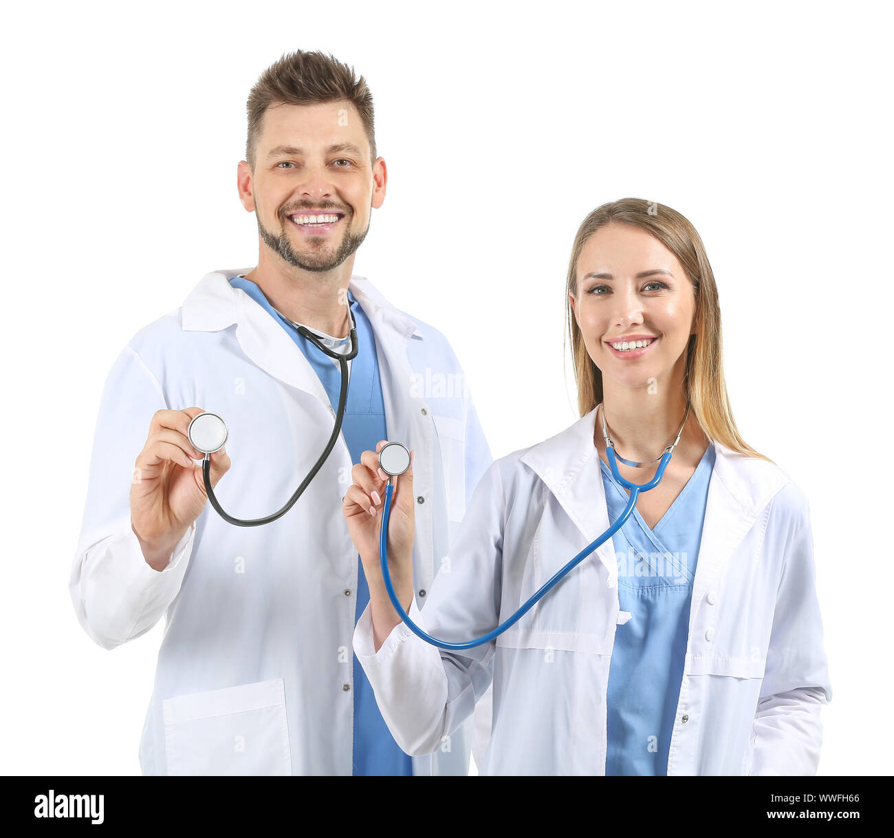 Male and female doctors with stethoscopes on white background Stock Photo - Alamy