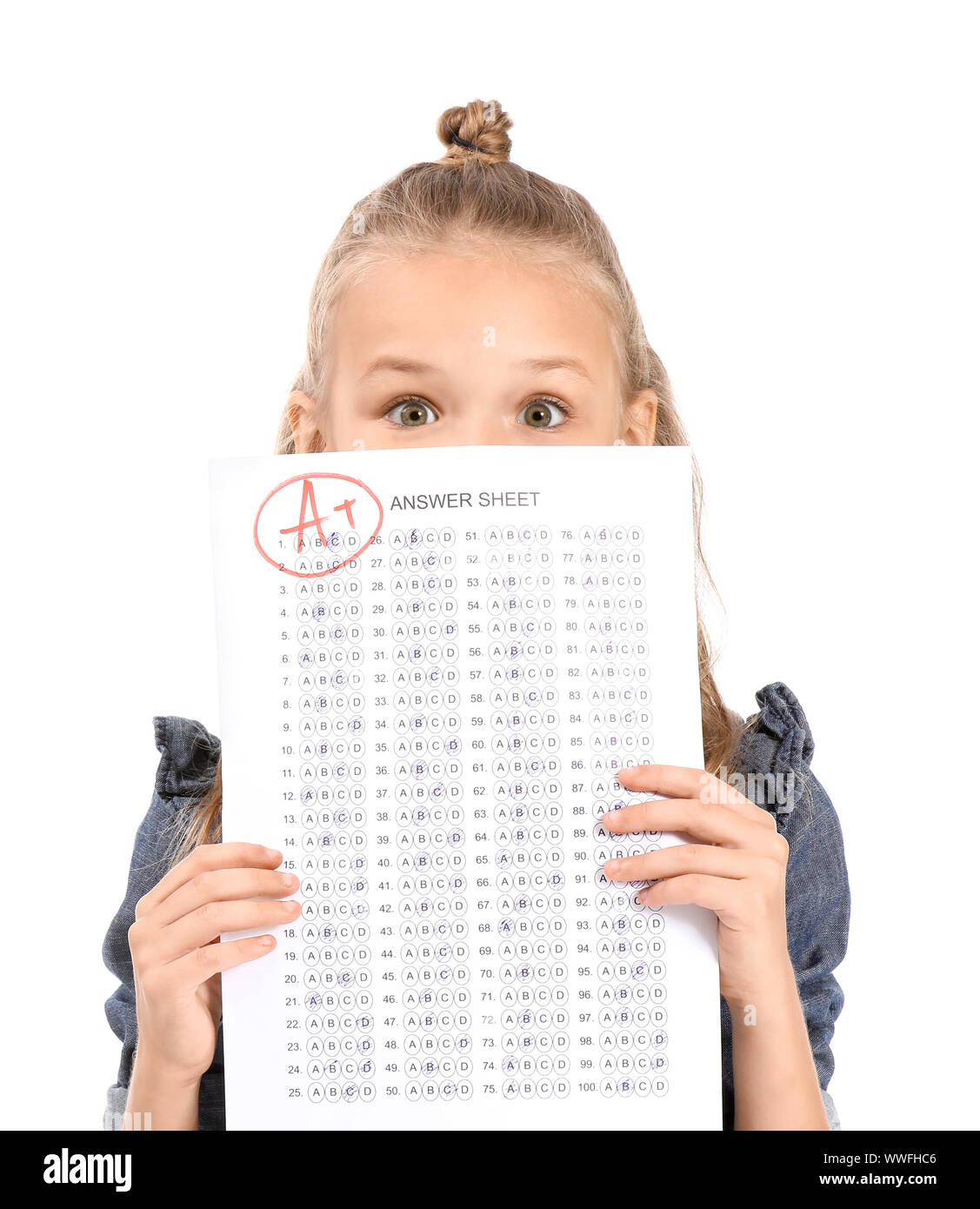 Girl with answer sheet for school test on white background Stock Photo ...