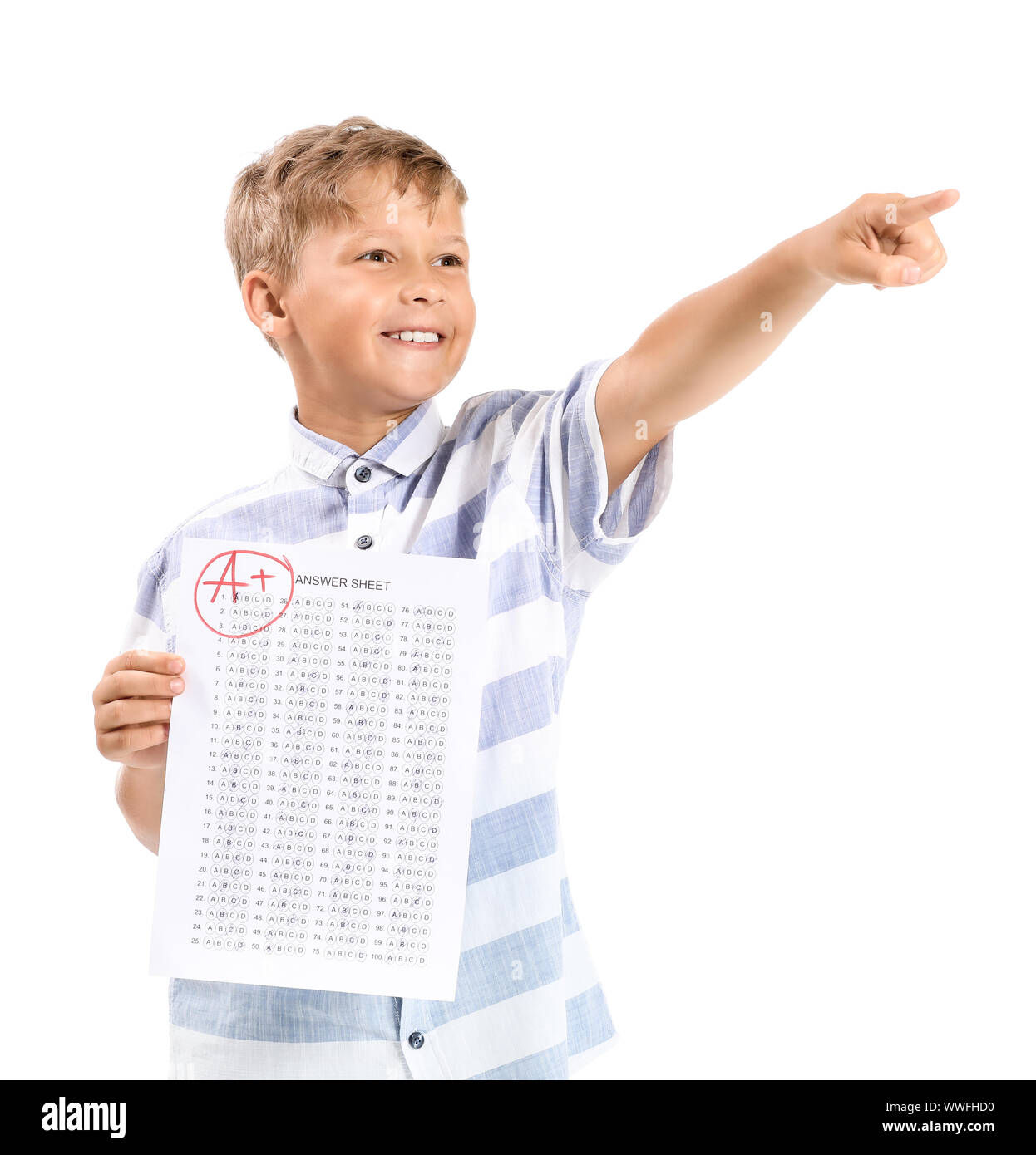 Happy boy with answer sheet for school test on white background Stock ...