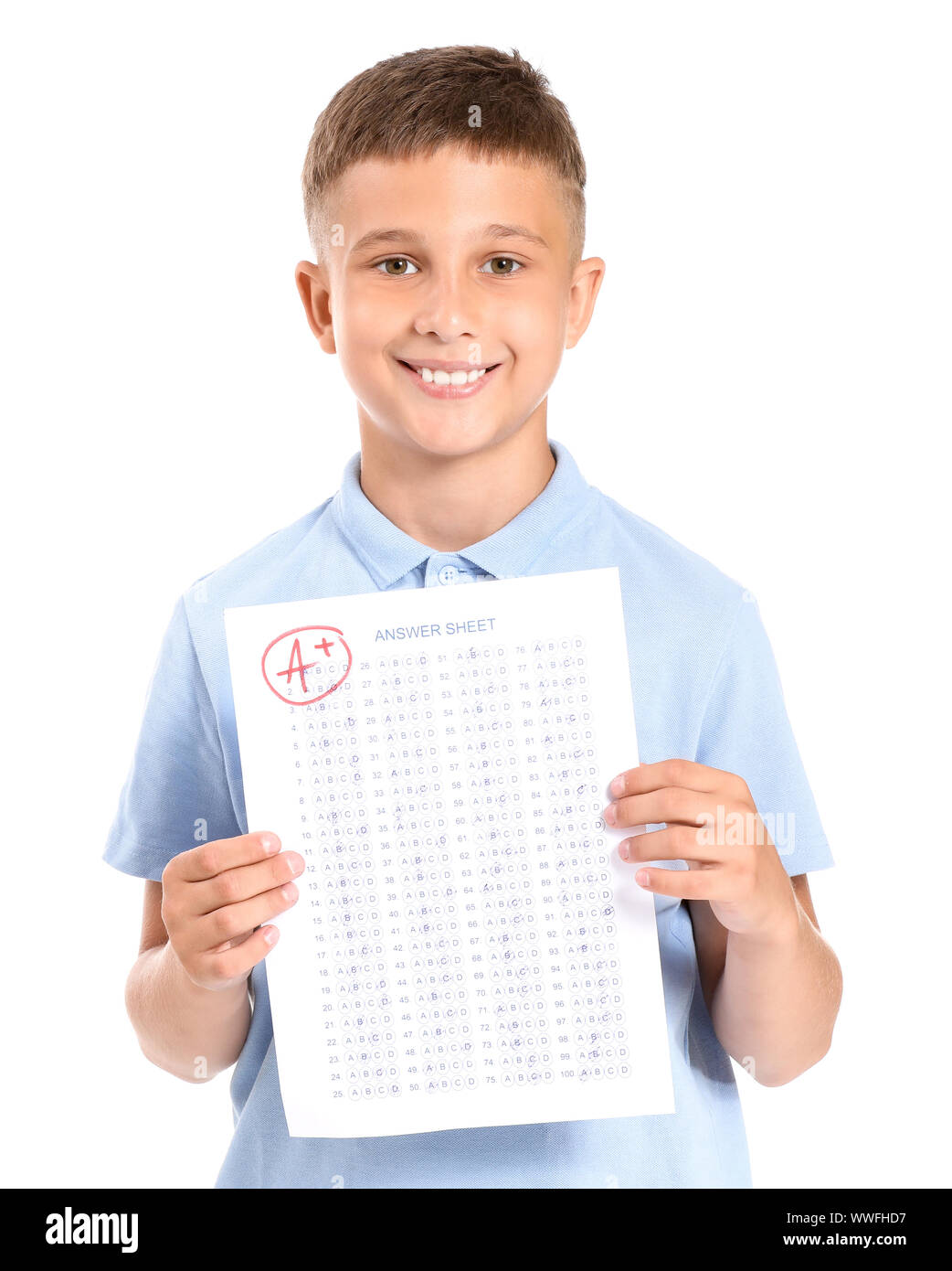Happy boy with answer sheet for school test on white background Stock ...