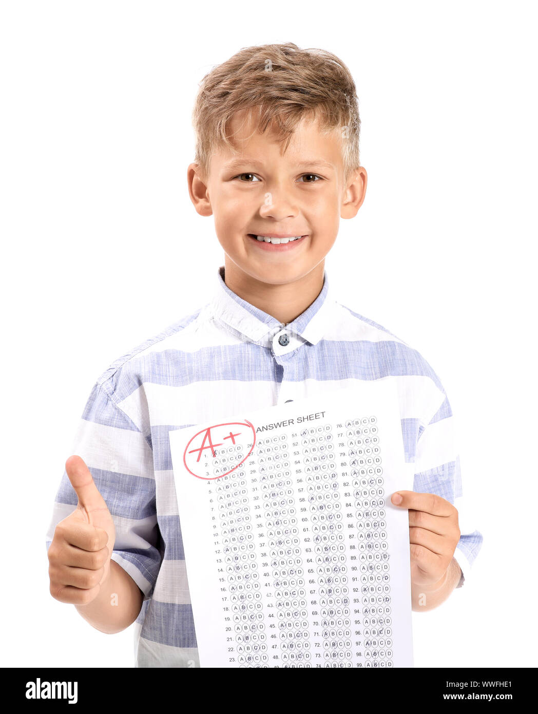 Happy boy with answer sheet for school test on white background Stock ...