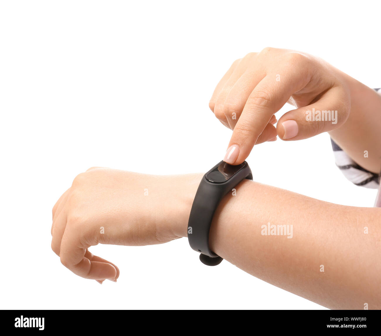 Woman with fitness band checking her pulse on white background Stock ...
