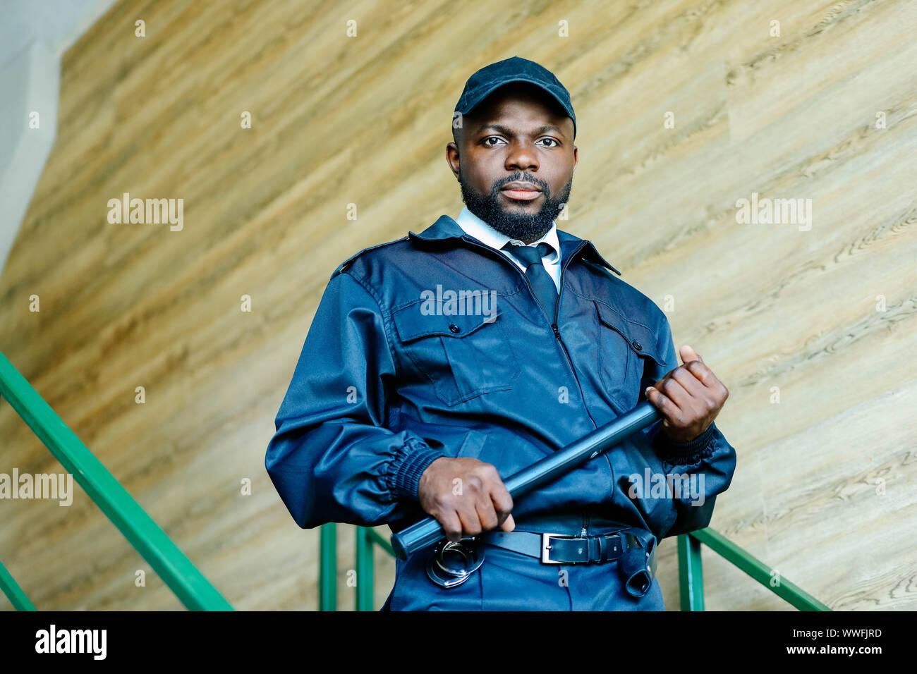 African-American security guard in building Stock Photo - Alamy