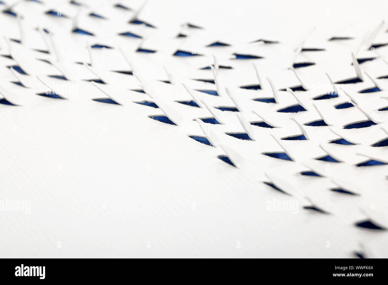 Texture of perforated paper, closeup Stock Photo - Alamy