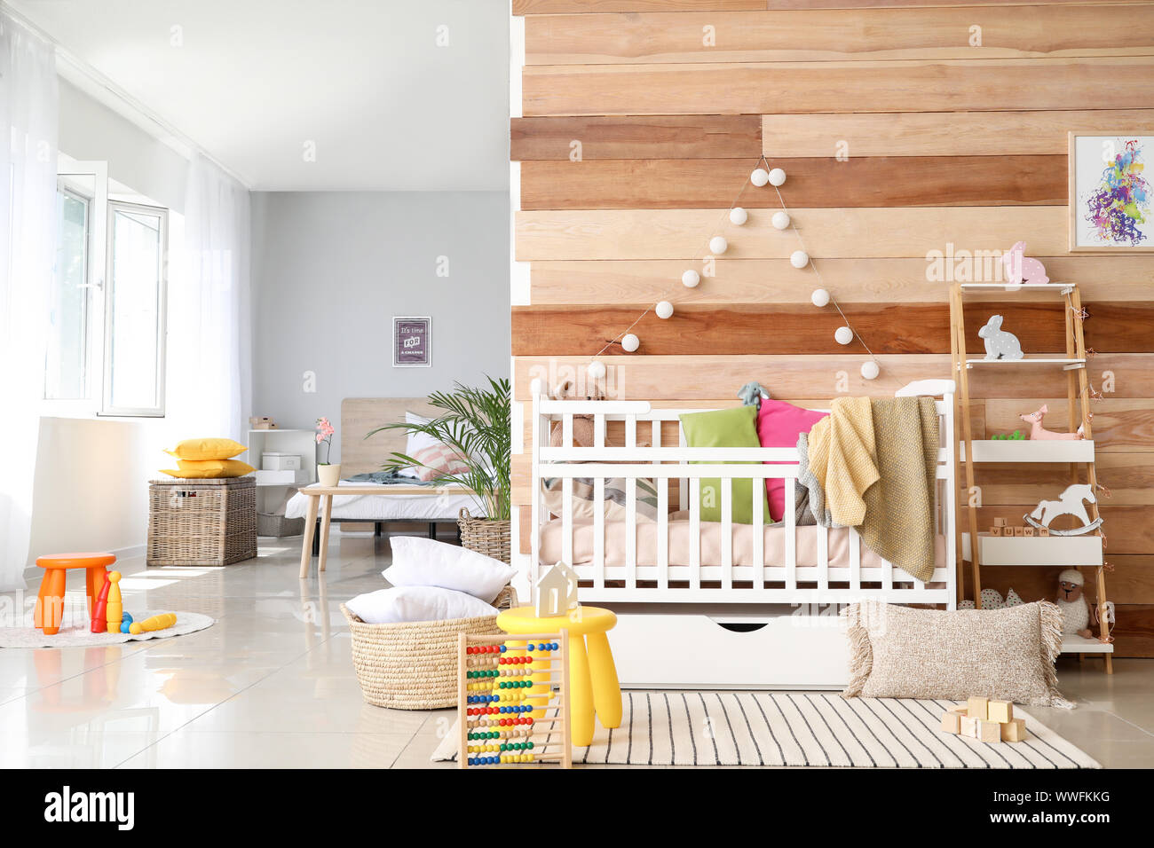 Interior of modern baby room with crib Stock Photo - Alamy