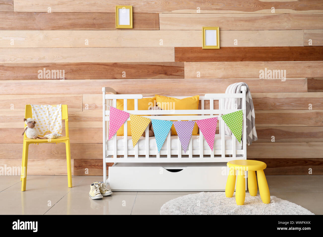 Interior of modern baby room with crib Stock Photo - Alamy