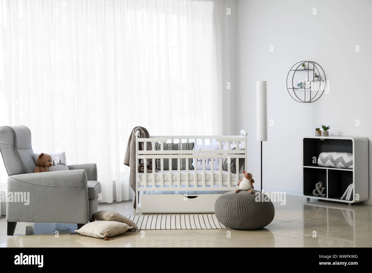 Interior of modern baby room with crib Stock Photo - Alamy