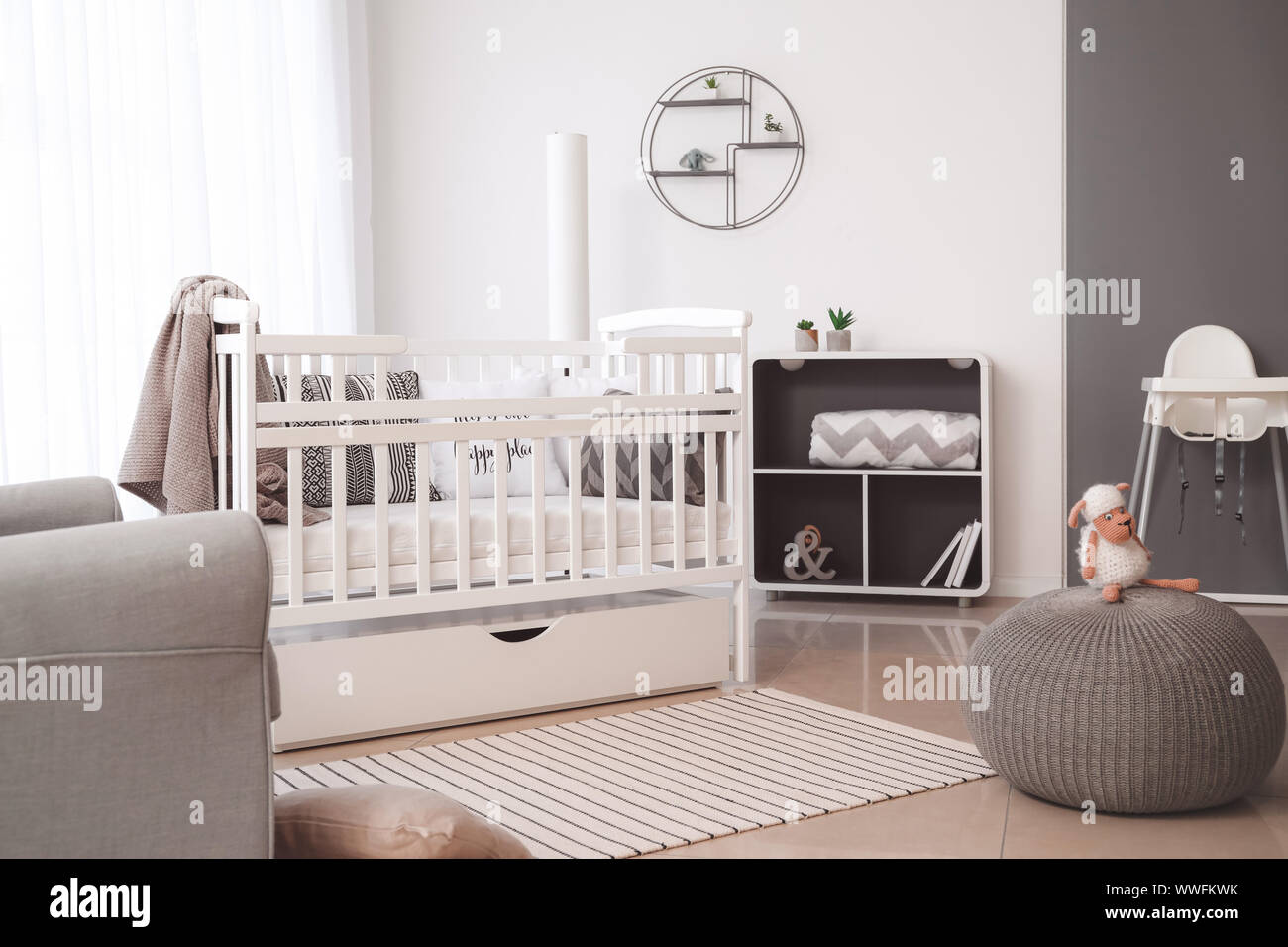 Interior of modern baby room with crib Stock Photo - Alamy