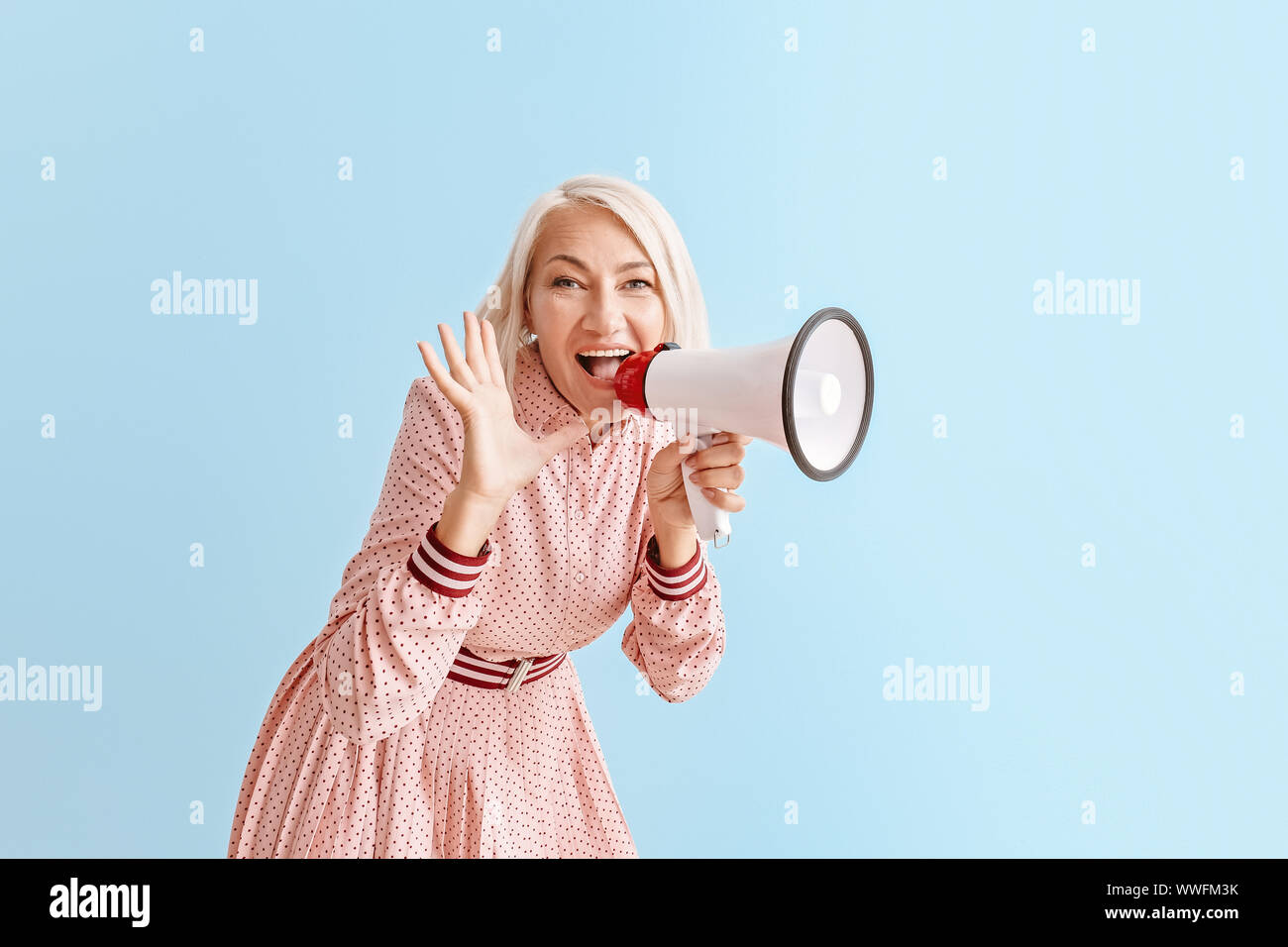Mature woman megaphone on hi-res stock photography and images - Alamy