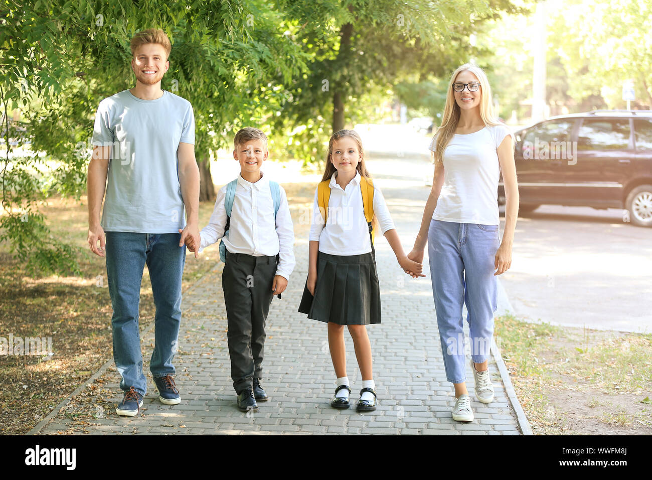 Children going to school hi-res stock photography and images - Alamy