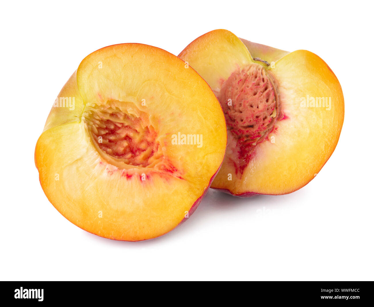 Ripe cut peach on white background Stock Photo - Alamy