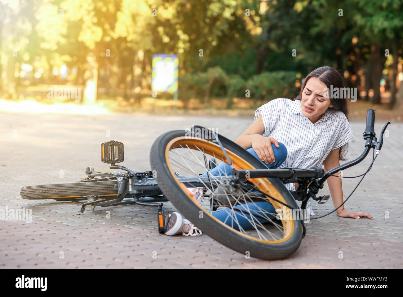 Female bicycle fallen hi-res stock photography and images - Alamy