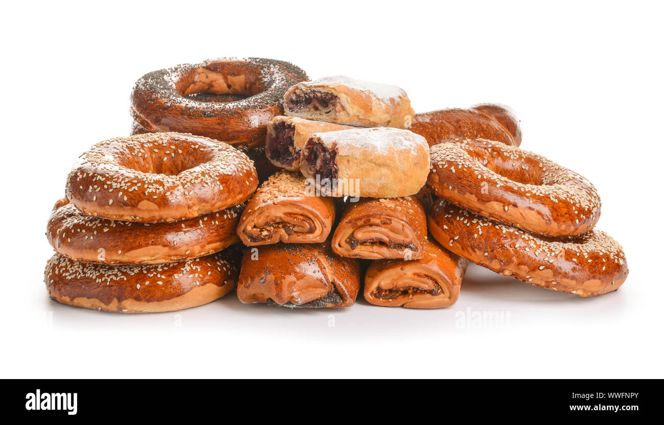 Heap of tasty pastries on white background Stock Photo - Alamy
