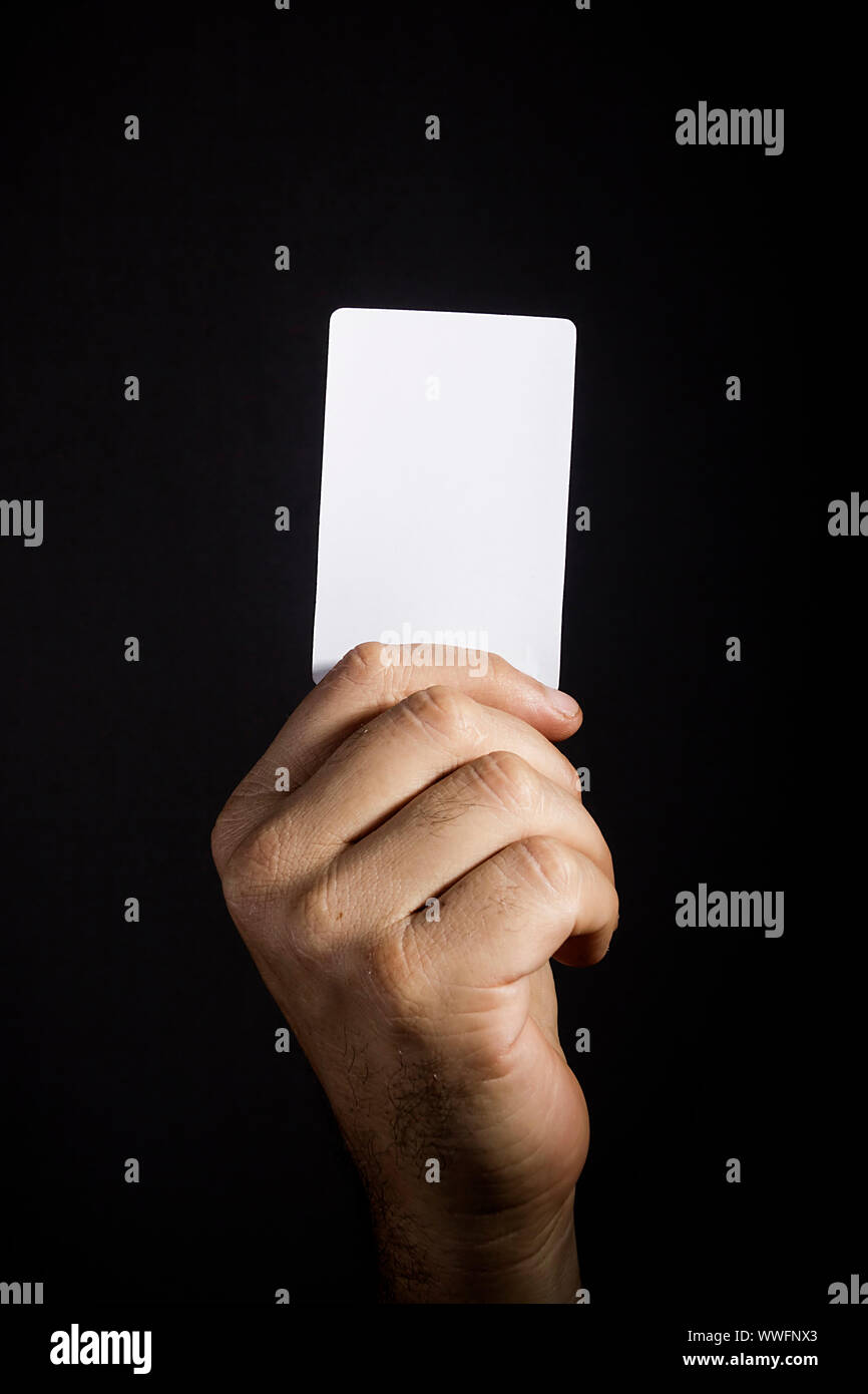 Male hand with a white cardboard card Stock Photo - Alamy