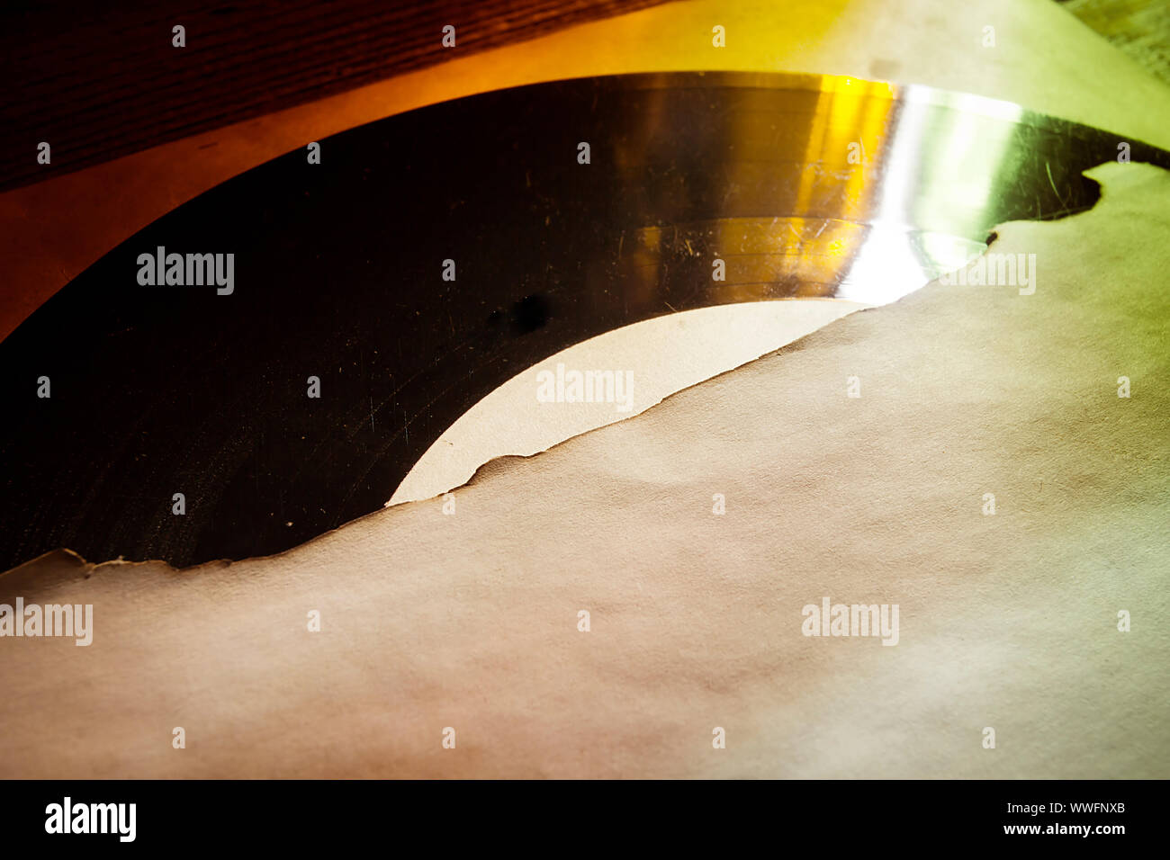 Vinyl record in an envelope on a wooden table Stock Photo - Alamy