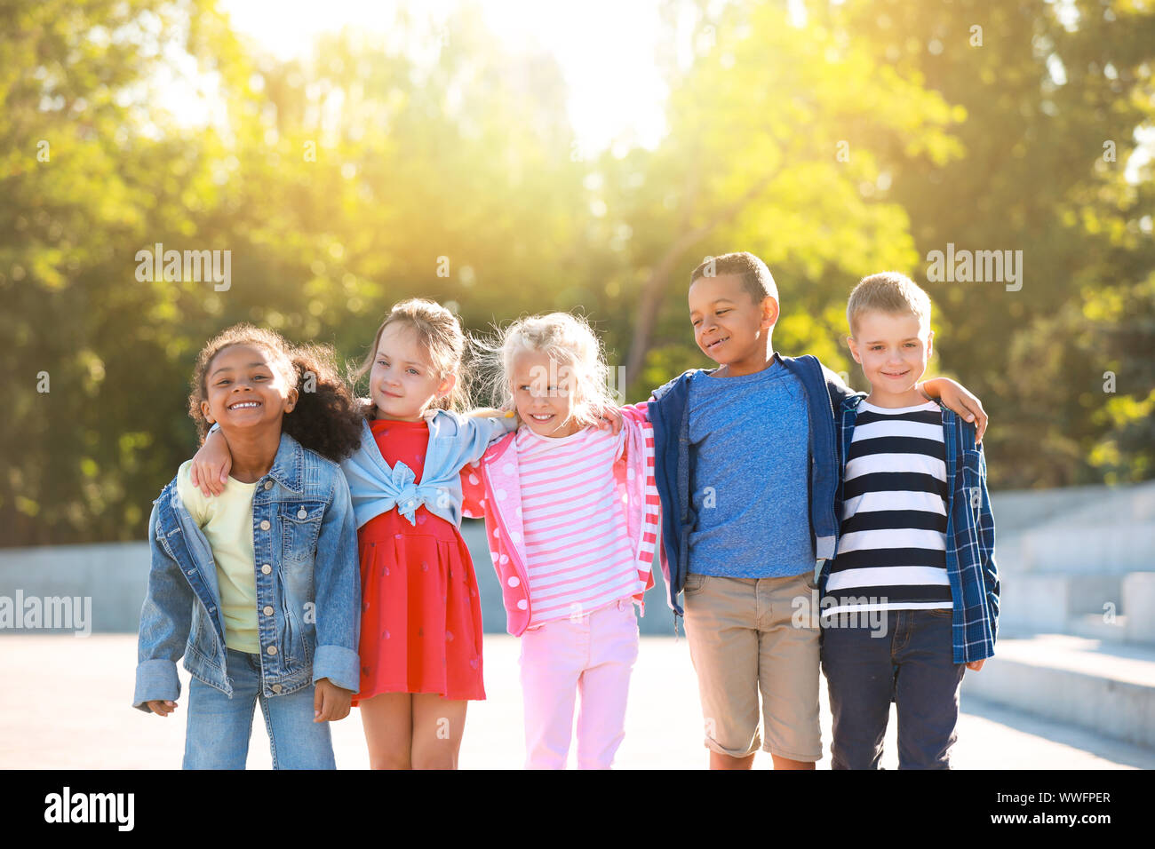 Group of happy children outdoors Stock Photo - Alamy