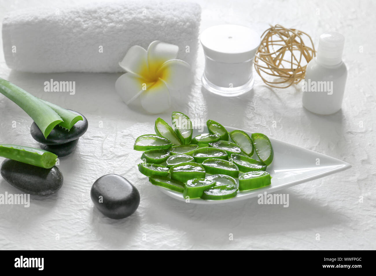 Spa composition with aloe vera on light background Stock Photo - Alamy