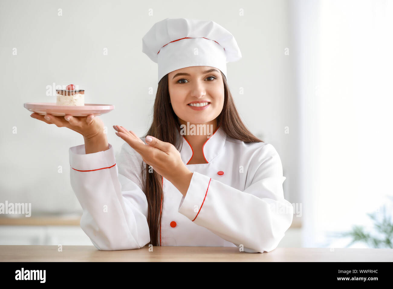 Beautiful female chef hi-res stock photography and images - Alamy