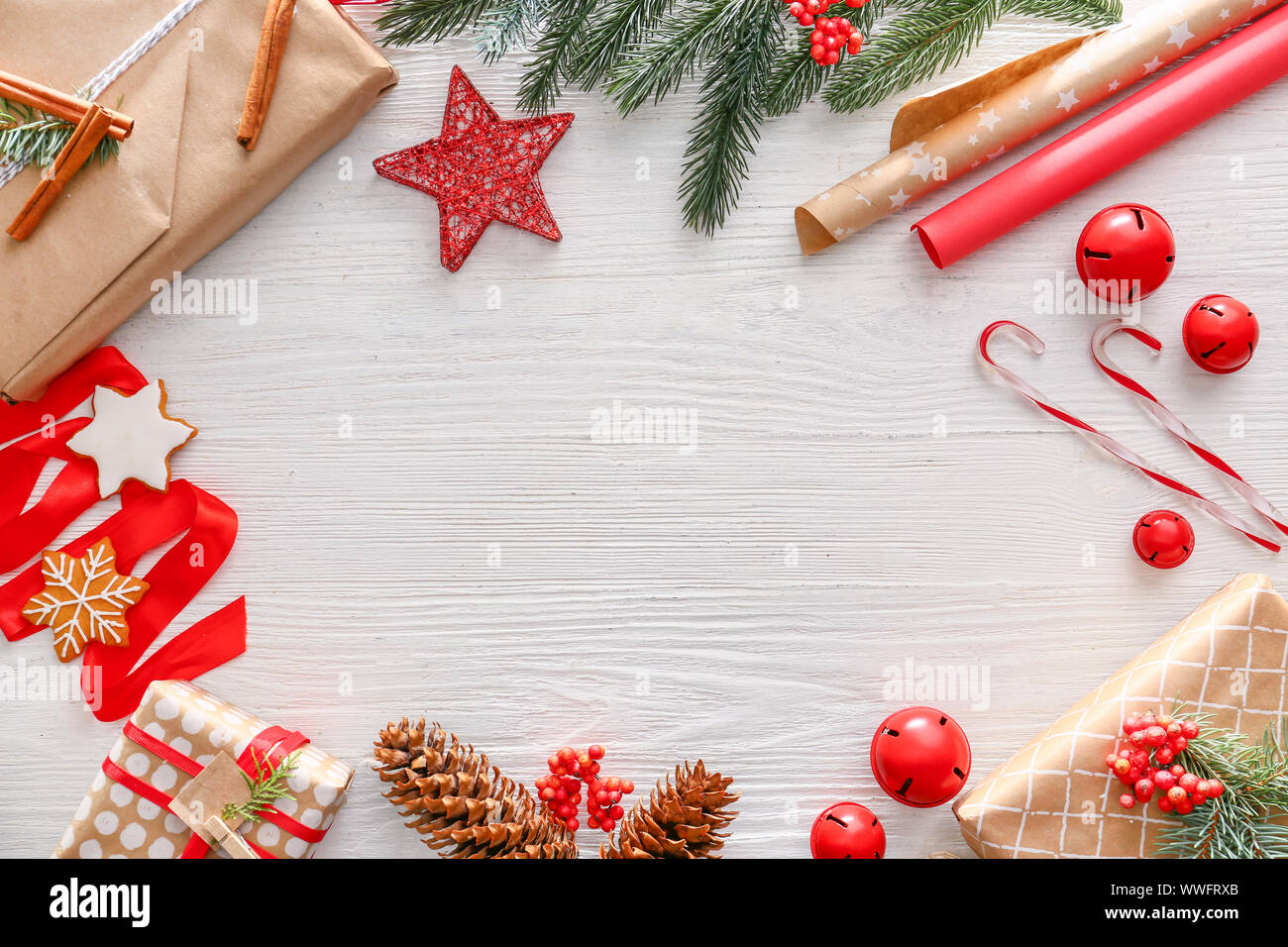 Frame made of Christmas gift boxes with decor on white wooden ...