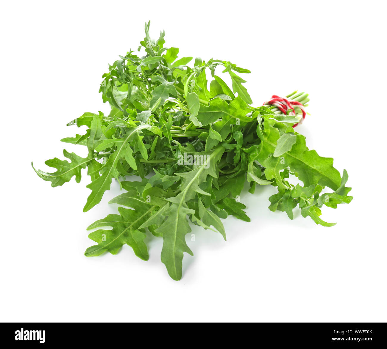 Fresh arugula on white background Stock Photo - Alamy