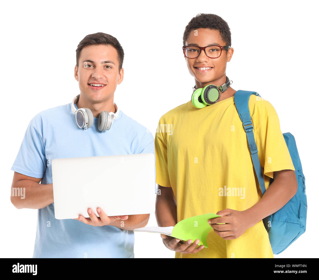 Portrait of young students with laptop on white background Stock Photo ...