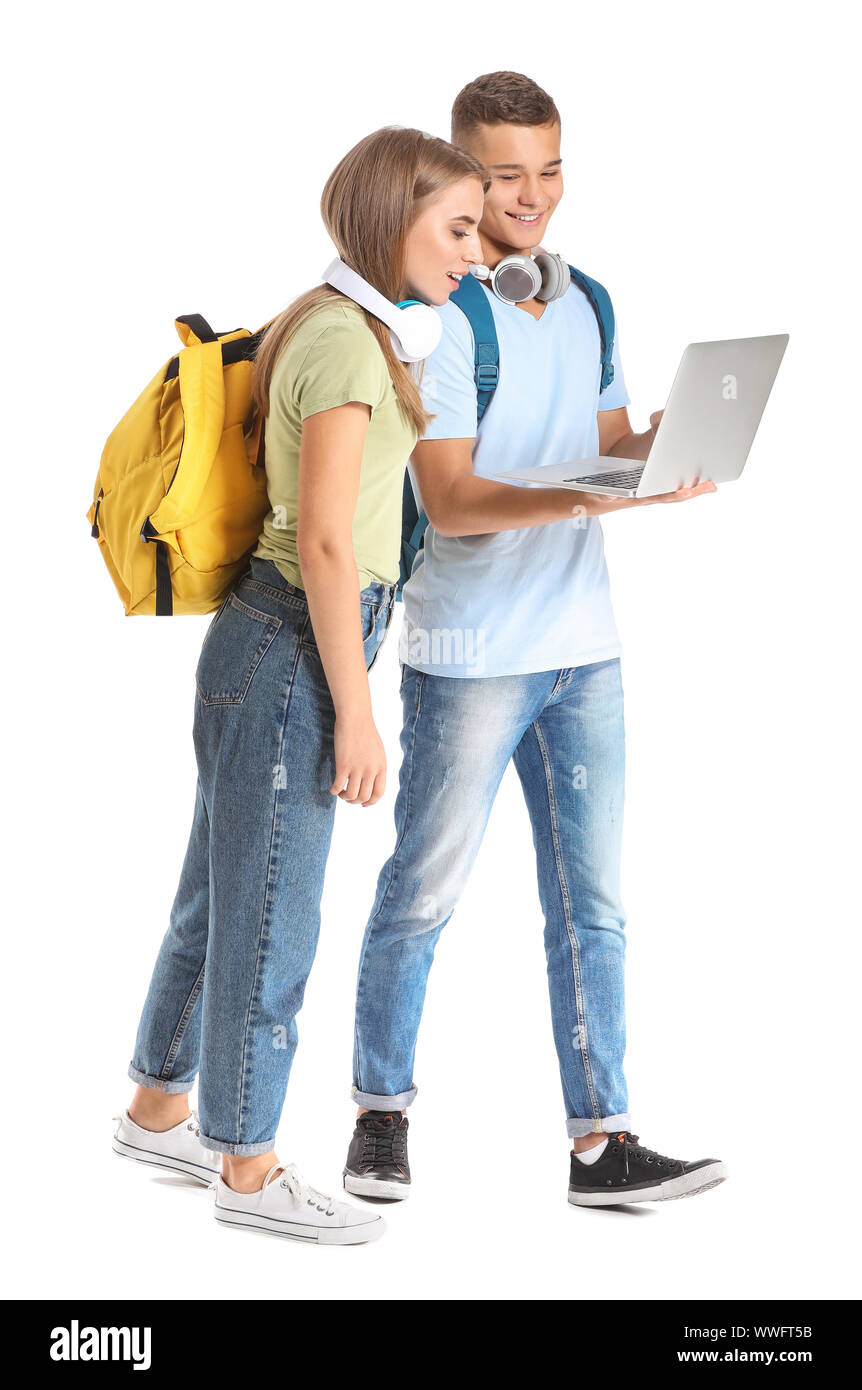 Portrait of young students with laptop on white background Stock Photo ...