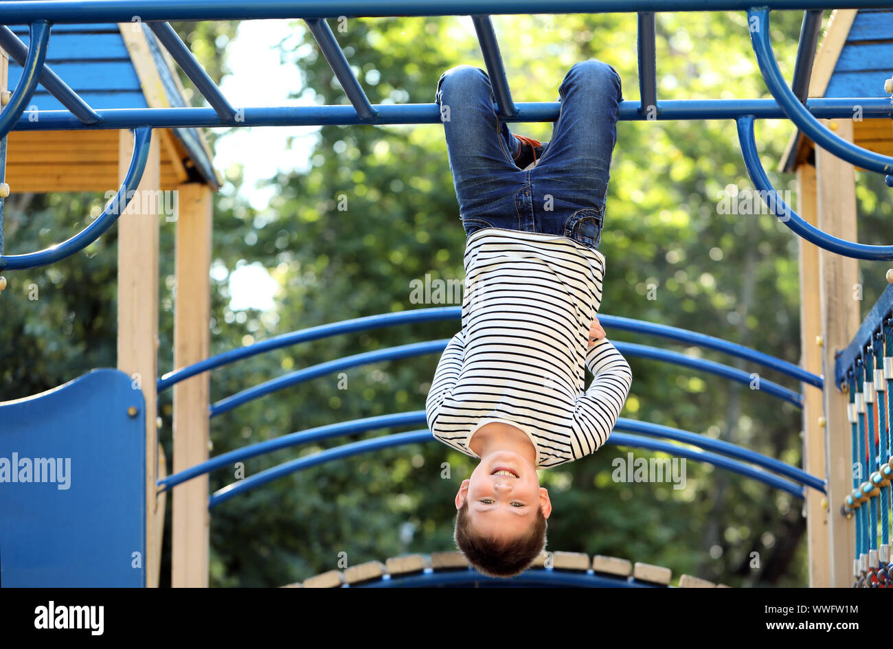 Cute little boy on playground Stock Photo - Alamy