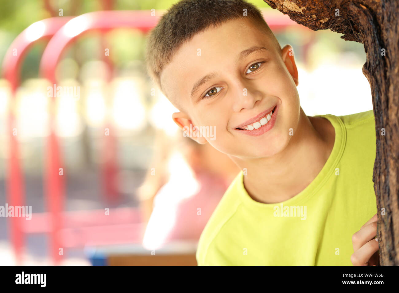 Boy near tree hi-res stock photography and images - Alamy