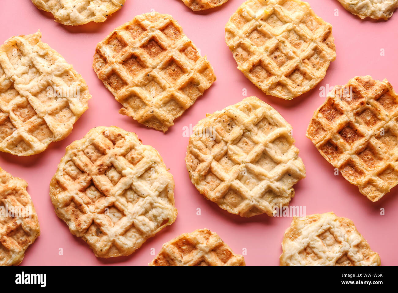 Tasty waffles on color background Stock Photo - Alamy