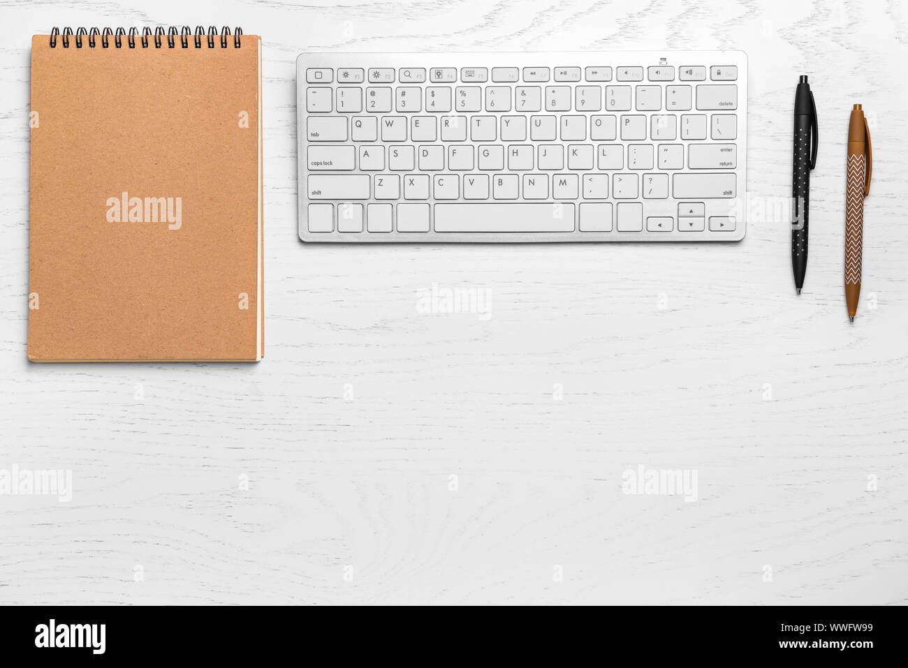 Modern computer keyboard with stationery on white background Stock ...