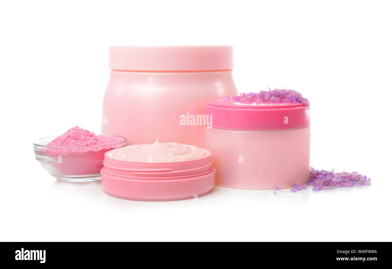 Different body cream on white background Stock Photo - Alamy