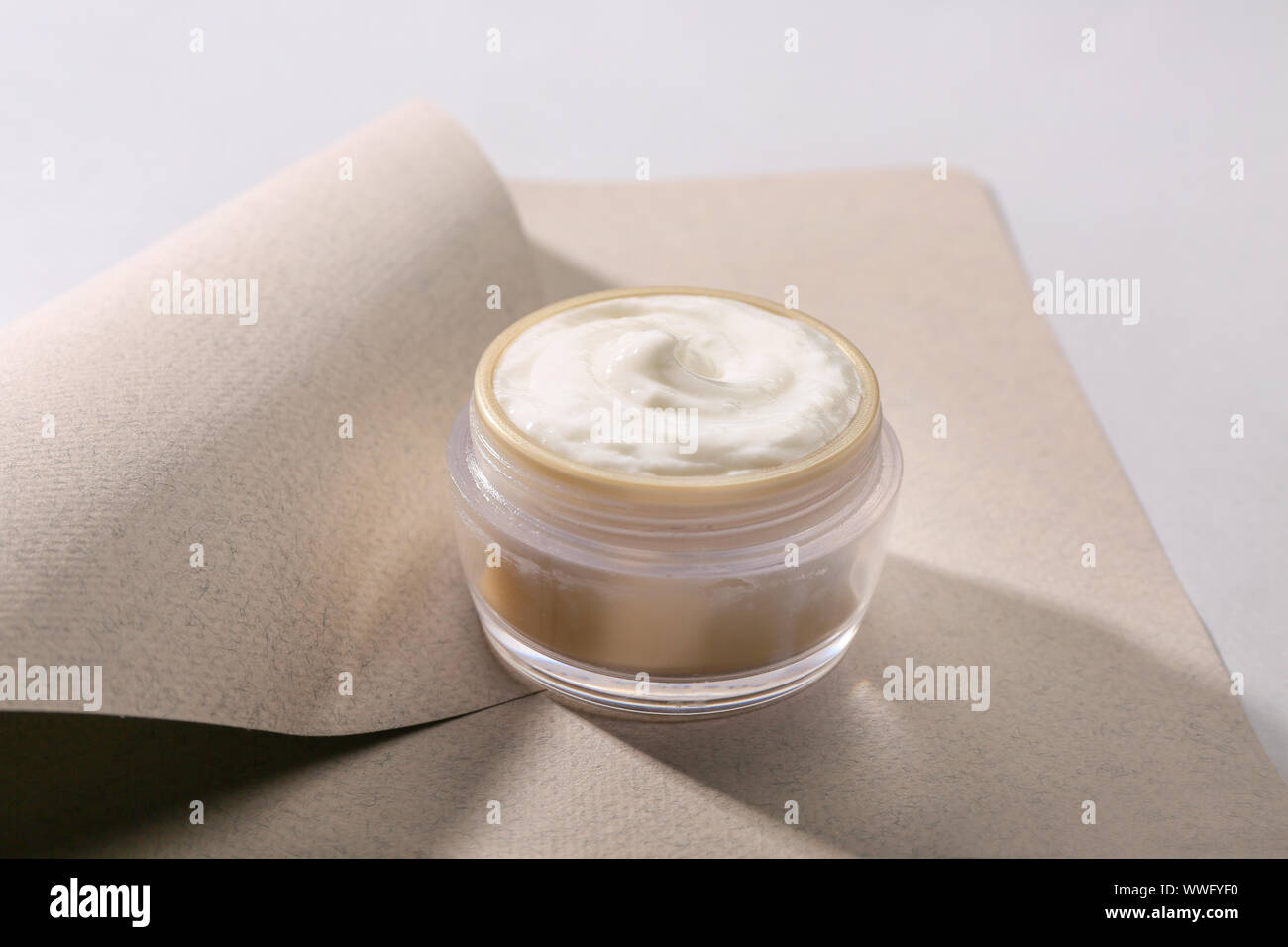 Jar of natural cream on light background Stock Photo - Alamy