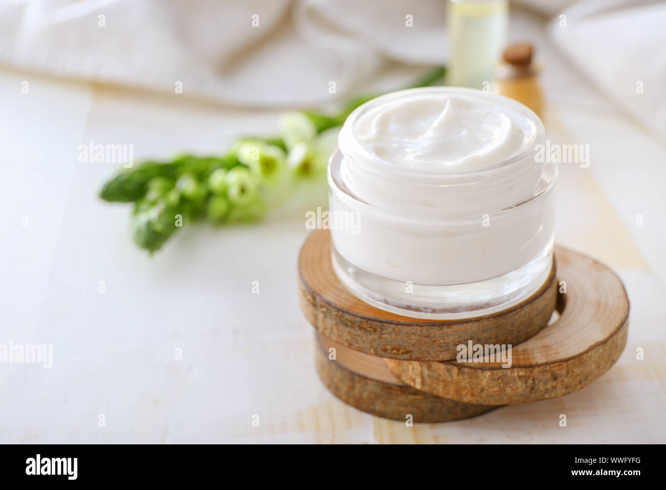Jar of natural cream on light background Stock Photo - Alamy