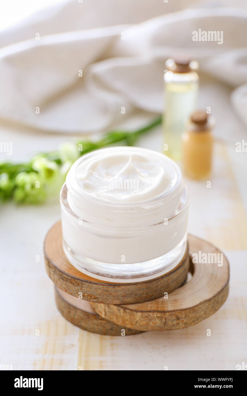 Jar of natural cream on light background Stock Photo - Alamy