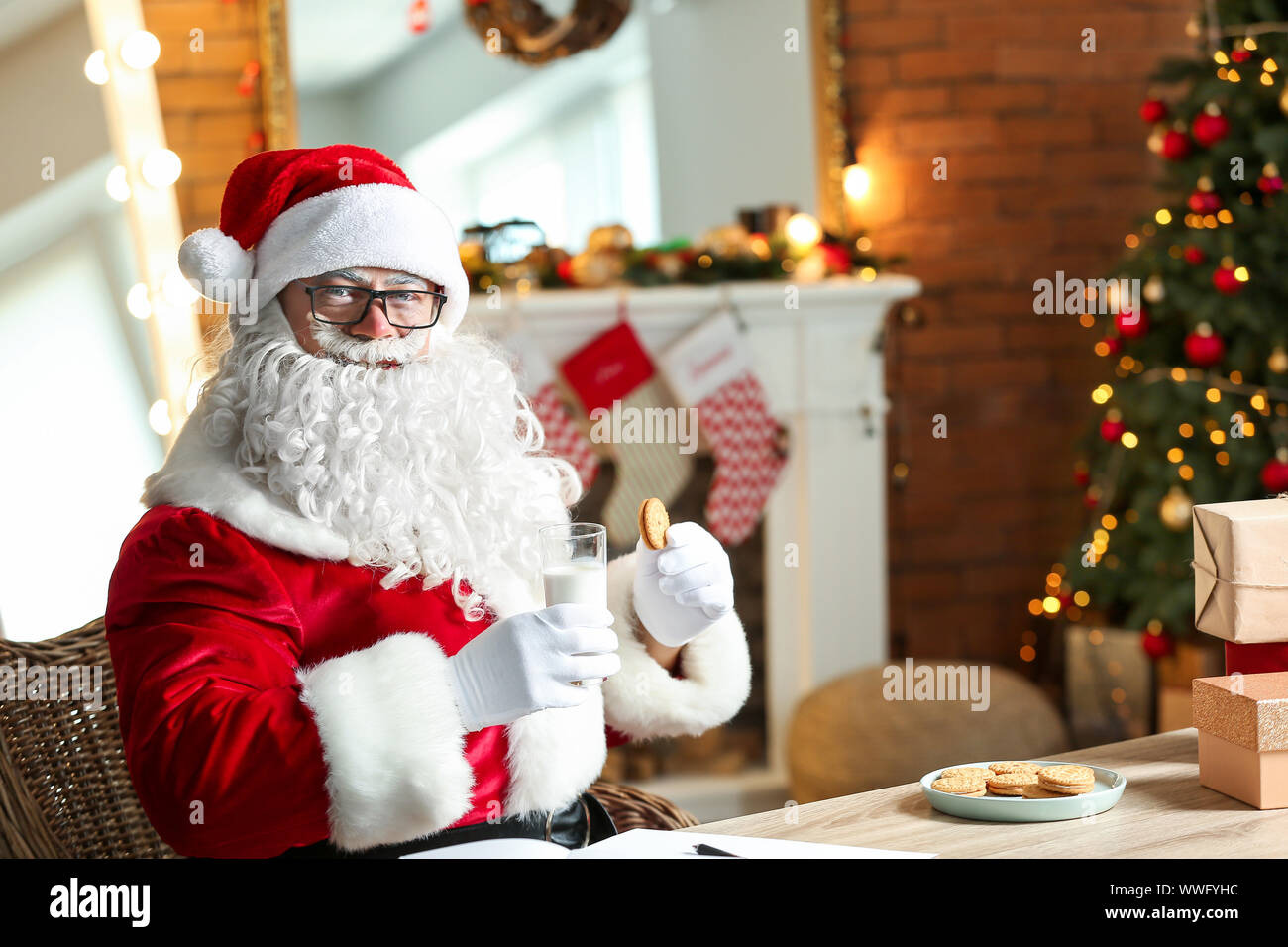 Santa claus drinking milk hi-res stock photography and images - Alamy