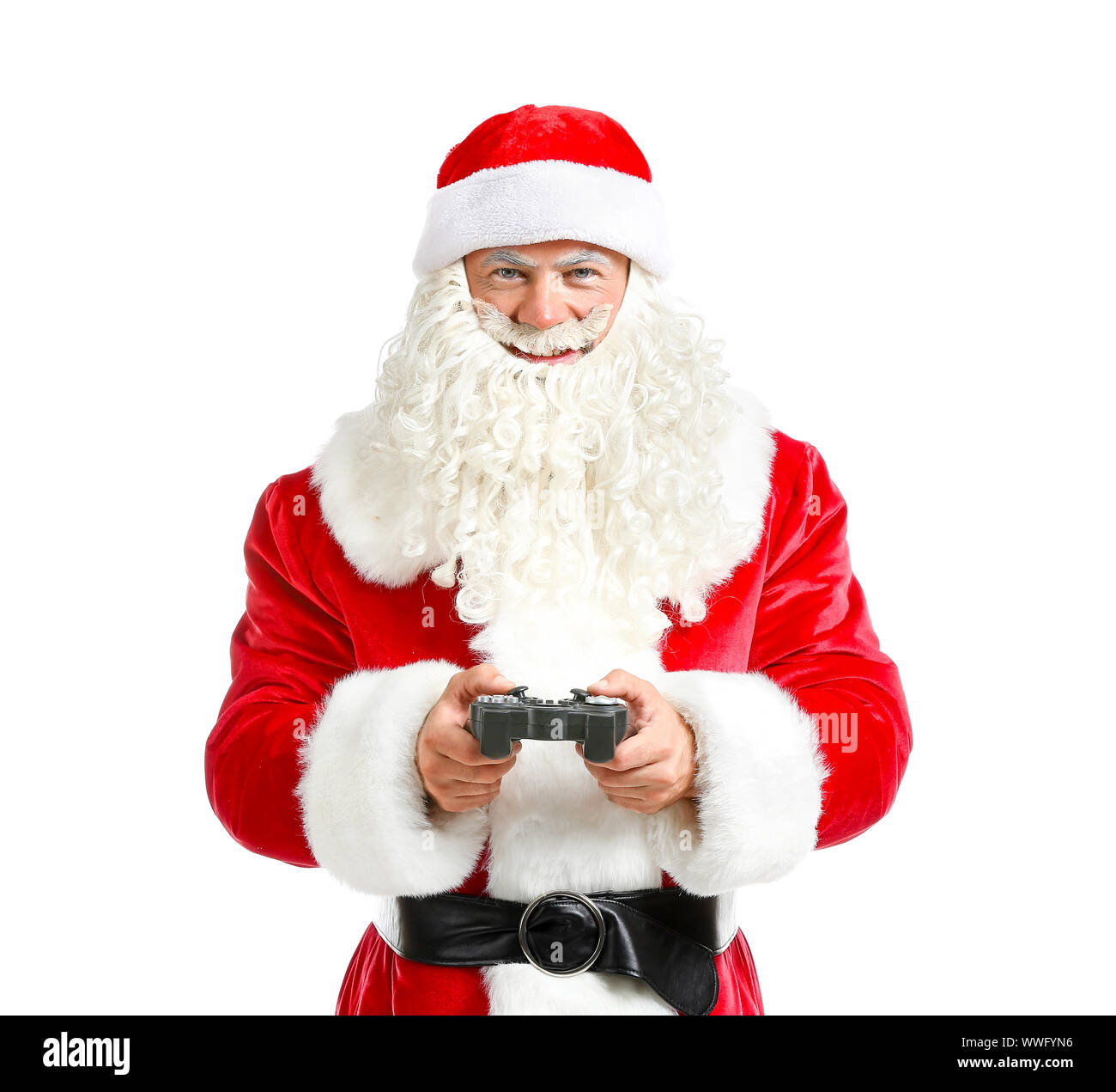 Santa Claus playing video game on white background Stock Photo - Alamy