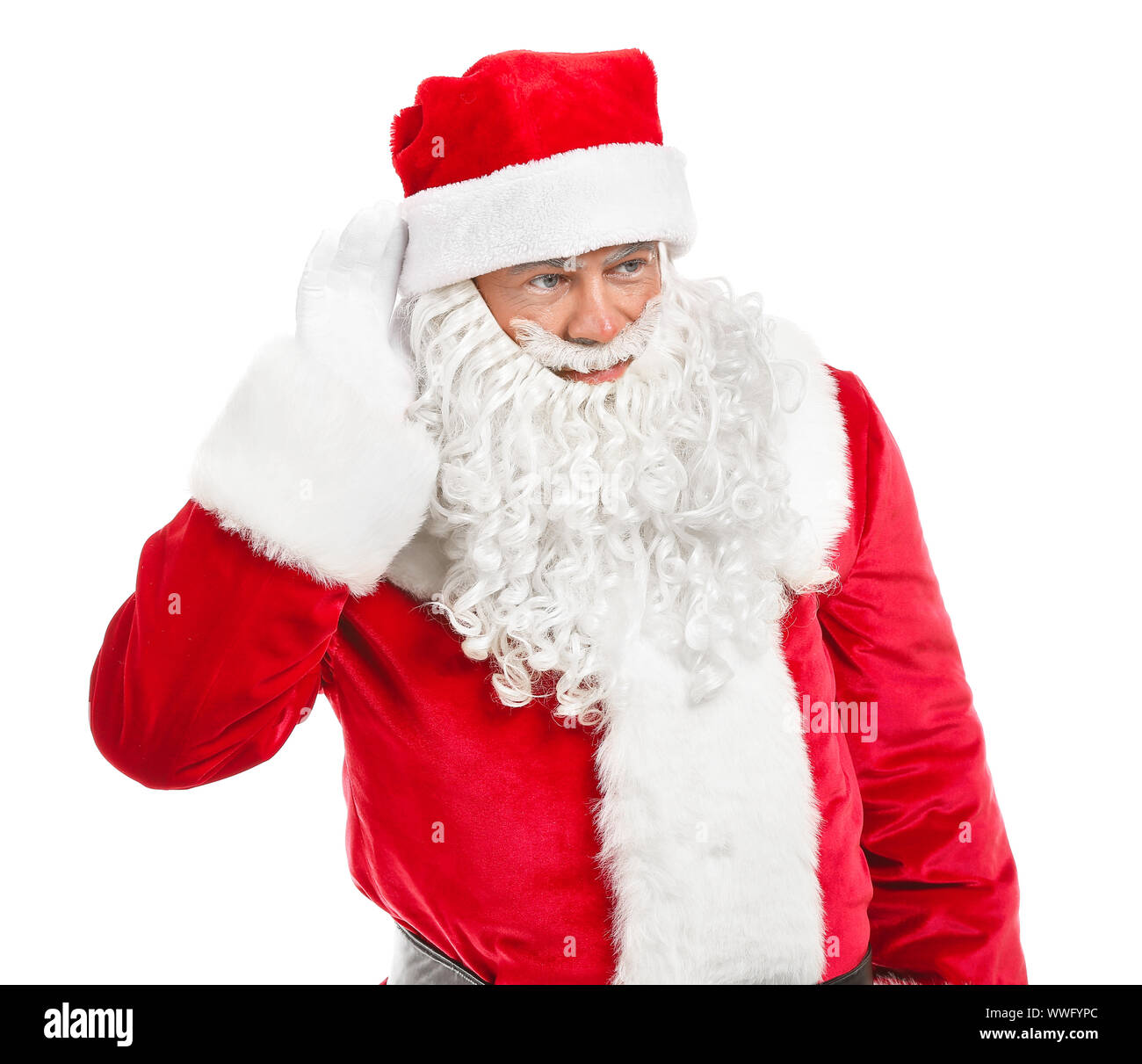 Portrait of Santa Claus trying to hear something on white background ...