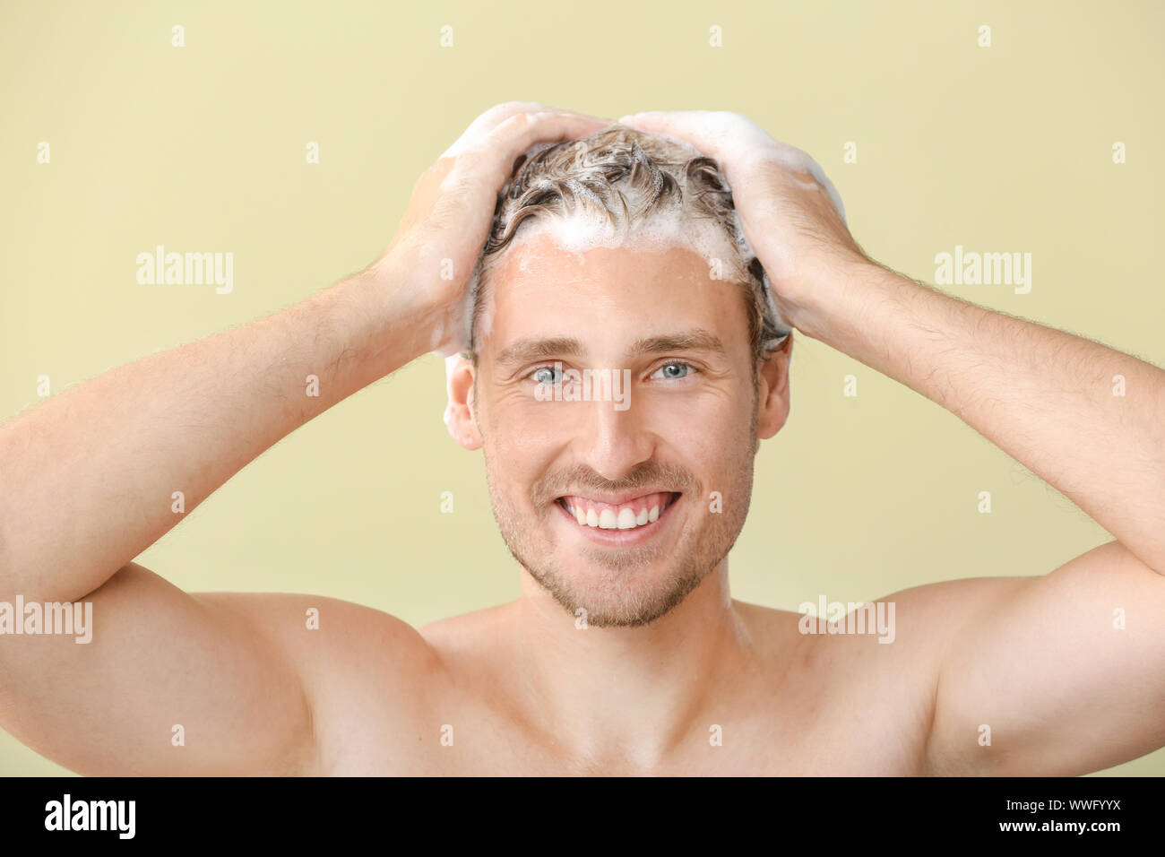 Man washing hair hi-res stock photography and images - Alamy