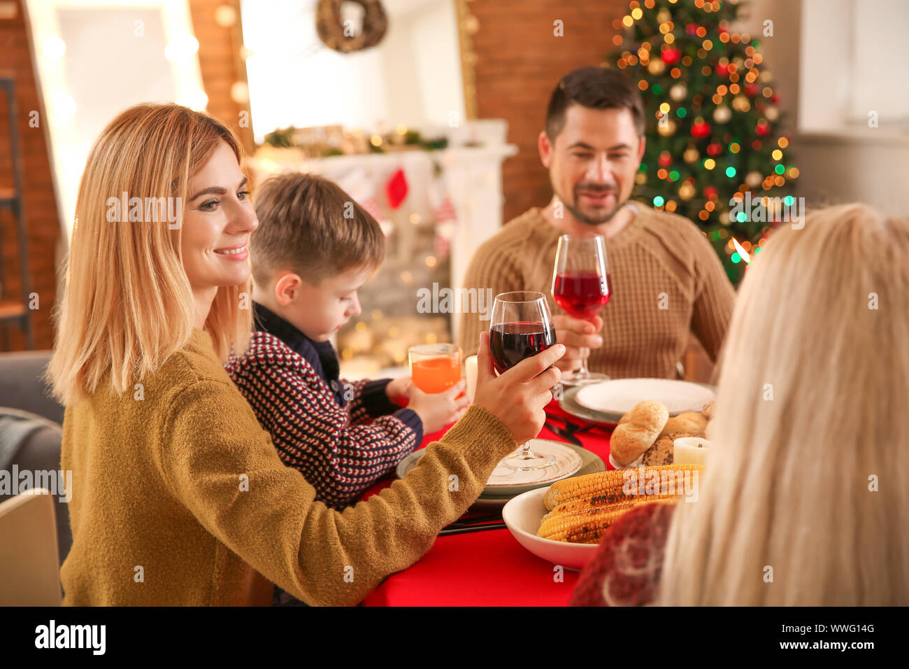 Child drinking alcohol dinner hi-res stock photography and images - Alamy